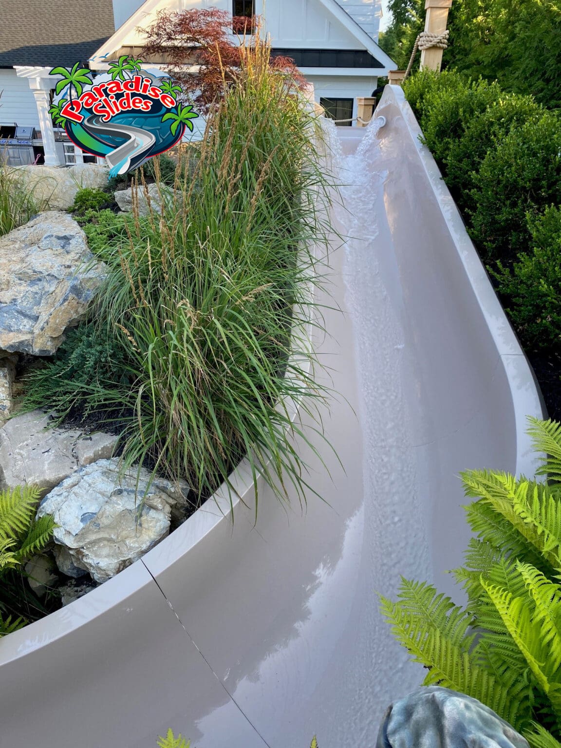 Featured Custom Home Pool Slide Project | Paradise Slides